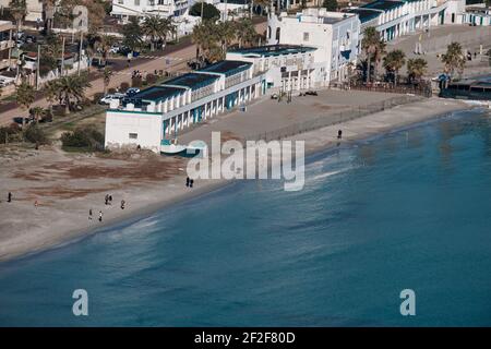 aerial view of the shoreline of poetto beach with buildings - Cagliari ...