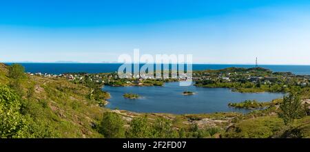 Wide panoramic view of the lake Sorvagvatnet and fishing town Sorvagen ...
