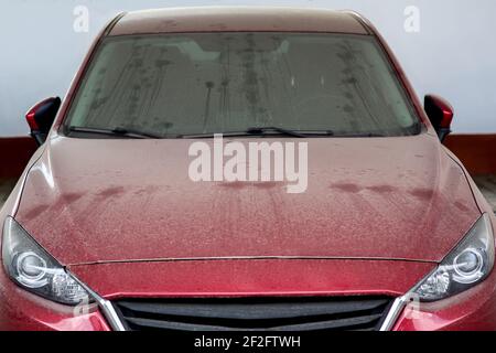 dirty red car windshield wipers covered with a layer of dust abandoned ...