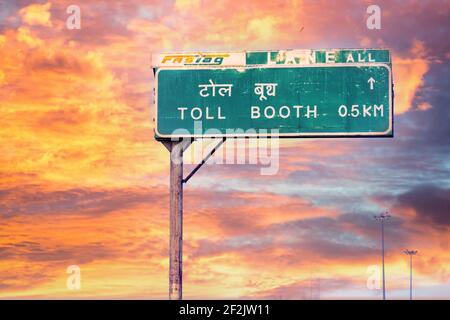 Fast Tag sign near a toll booth showing the new cashless RFID based ...