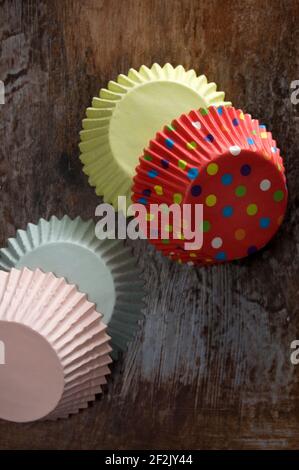 Mini muffins on a old wooden table, top view with copy space for text ...