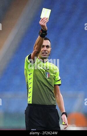 Marco Di Bello shows the yellow card to Andrea Belotti during the Serie ...