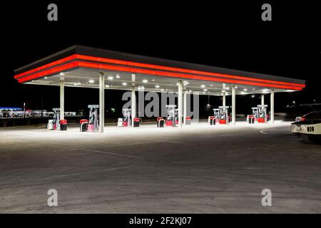 Horizontal shot of a generic gasoline station and convenience store at ...