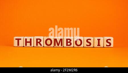 Medical and and thrombosis symbol. Wooden cubes with the word ...