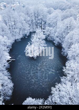 Aerial shot of winter landscape near italian apennines road covered in ...