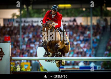 Steve GUERDAT (SUI) riding Hannah during the Nations Cup of the World ...