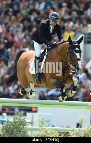 Eric Lamaze riding Coco Bongo during the 2019 Longines FEI Jumping ...