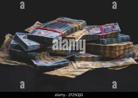 A closeup shot of a pile of Lei banknotes Stock Photo - Alamy