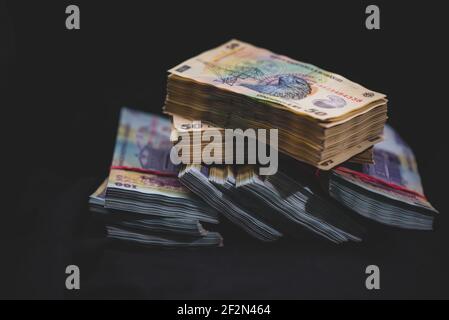 A closeup shot of a pile of Lei banknotes Stock Photo - Alamy