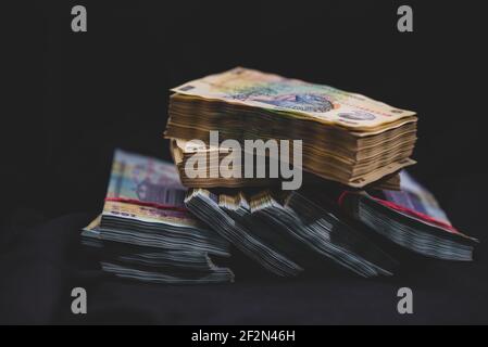 A closeup shot of a pile of Lei banknotes Stock Photo - Alamy