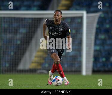 Blackburn, UK. 12th Mar, 2021. Ivan Toney #17 of Brentford has a shot ...