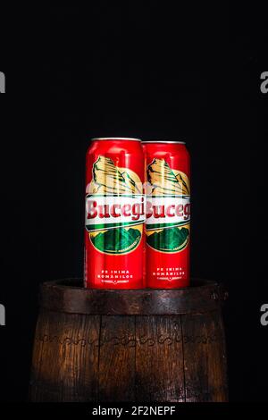 Can of Bucegi beer on beer barrel with dark background. Illustrative ...