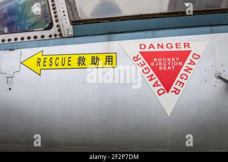 Close up of the cockpit rescue warning signs on the side of a ...