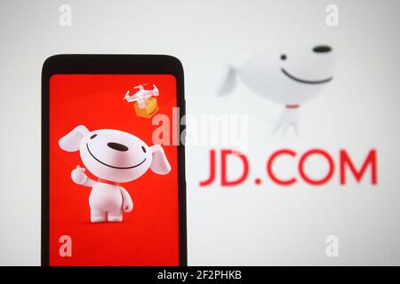 In this photo illustration a JD.com, Inc. also known as Jingdong logo ...