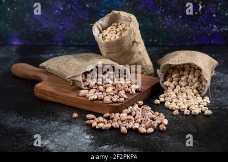 Sackcloth of dried raw beans placed on dark background Stock Photo - Alamy