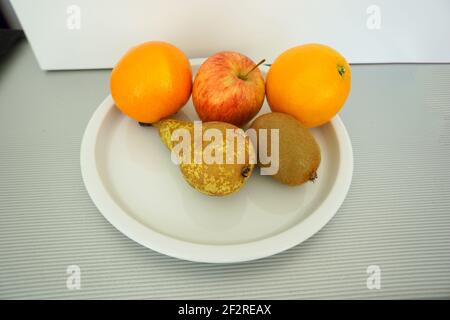 Fresh fruit in the hospital photographed on the tray with natural light ...