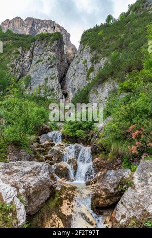 View of waterfall Pisciadu (Cascate del Pisciadù) and northern cliffs ...