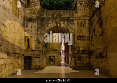 Night view of the golden gate of Diocletian palace in Split, Croatia ...
