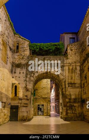 Night view of the golden gate of Diocletian palace in Split, Croatia ...