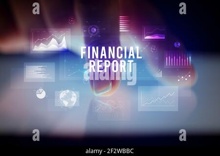 Finger touching tablet with business graphs and icons concept Stock ...