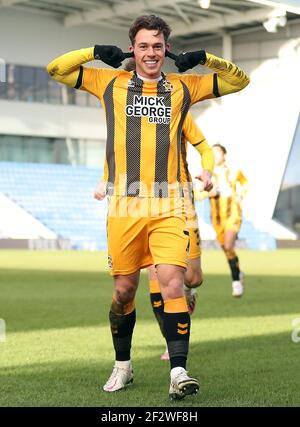 Cambridge United's Luke Hannant celebrates scoring their side's fourth ...