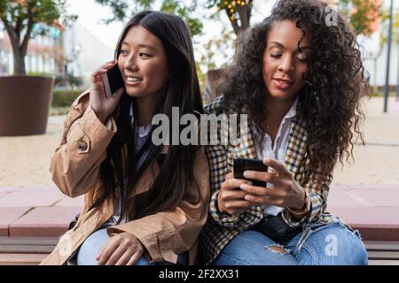 Asian women using smartphone for video call telemedicine consultation ...
