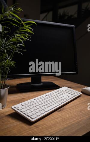 Workplace. Computer, keyboard and mouse on wooden table, close up Stock ...