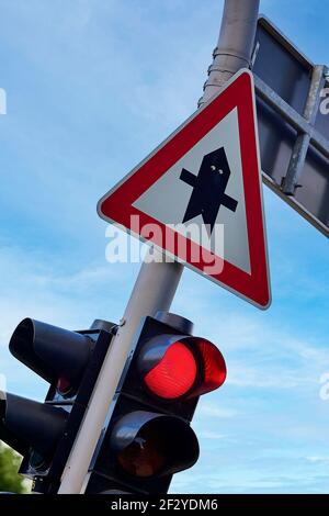Traffic stop sign at an intersection with speed bump Stock Photo - Alamy