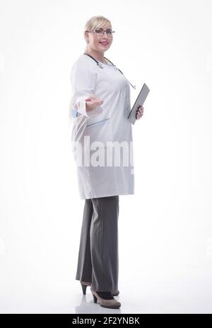 friendly female doctor with clipboard looking at you Stock Photo - Alamy