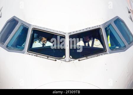 Lufthansa pilot and first officer in the cockpit of the Boeing 747-8 ...