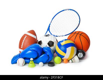 Set of sports equipment with fitness ball near light wall Stock Photo ...