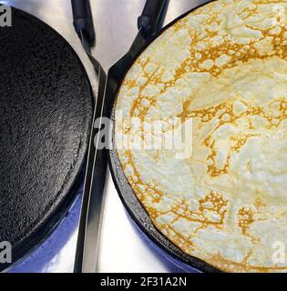 Pancake on frying pan view from above in a cafe Stock Photo - Alamy