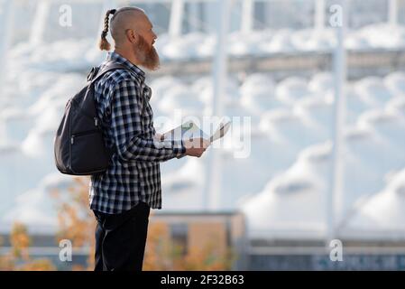 Adventure and traveling concept with hands holding a world GO written ...