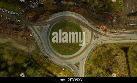 Aerial view of dirt road and roundabout in winter on sunny day Stock ...