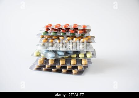 too many different pill cartridges stacked. selective Focus. Packs of ...