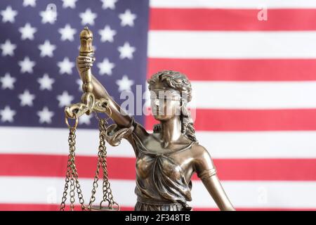 Lady Justice and American flag. Symbol of law and justice with USA Flag ...