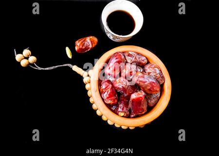 Small pot filled with dates Stock Photo - Alamy
