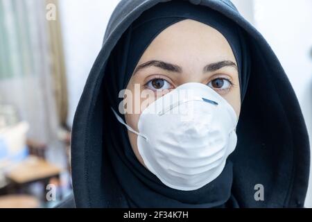 Arabic muslim females wearing masks Stock Photo - Alamy