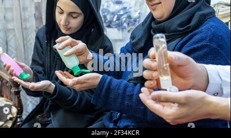Arabic Muslim family using hygiene products Stock Photo - Alamy