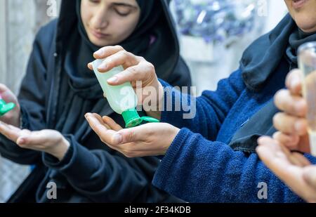 Arabic Muslim family using hygiene products Stock Photo - Alamy
