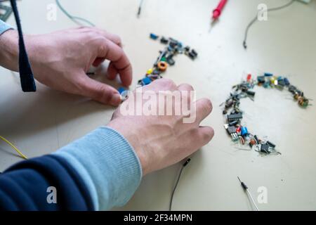 IC word formed by electronic parts Stock Photo - Alamy