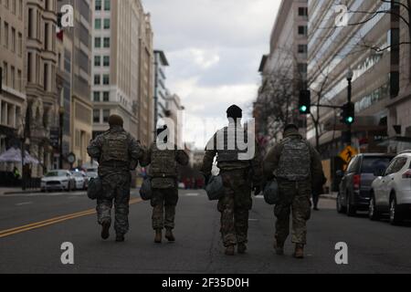 National Guard troops patrol the streets ahead of a UFC fight on the ...