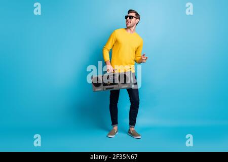 Photo of carefree crazy person arm touch headphones enjoy playlist ...