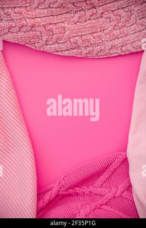 Frame of pink sweaters with copy space for text, womanly accessories ...