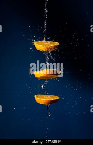 Creative composition with fresh orange slices on white background, top ...