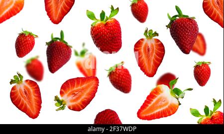 Different ripe strawberries and strawberry slices isolated on pink ...
