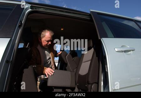 JOHN SIMISTER IN THE MAZDA 5. 1/11/05 TOM PILSTON Stock Photo - Alamy