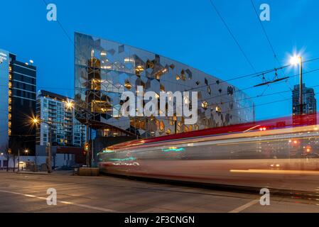 Exterior of the New Calgary Central Library. The exterior is a textured ...