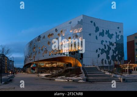 Exterior of the New Calgary Central Library. The exterior is a textured ...