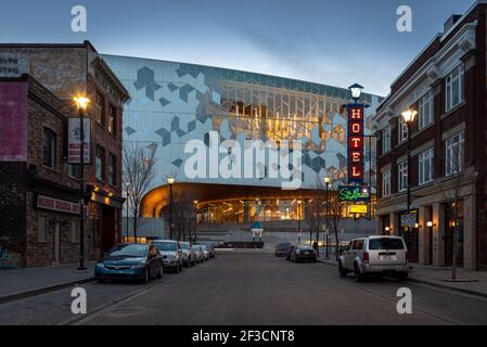 Exterior of the New Calgary Central Library. The exterior is a textured ...